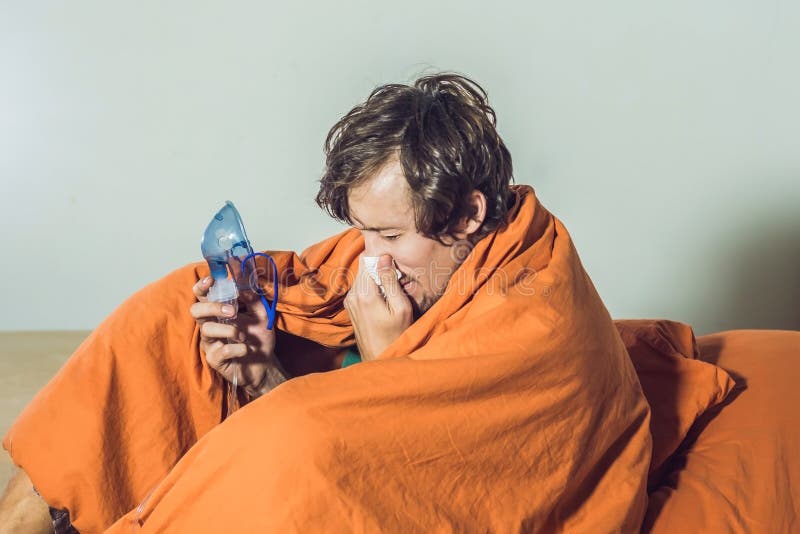 Man with Flu or Cold Symptoms Making Inhalation with Nebulizer - Stock ...