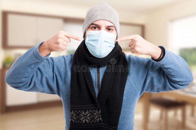Man with Flu Wearing a Face Mask Stock Photo - Image of pointing, mask ...