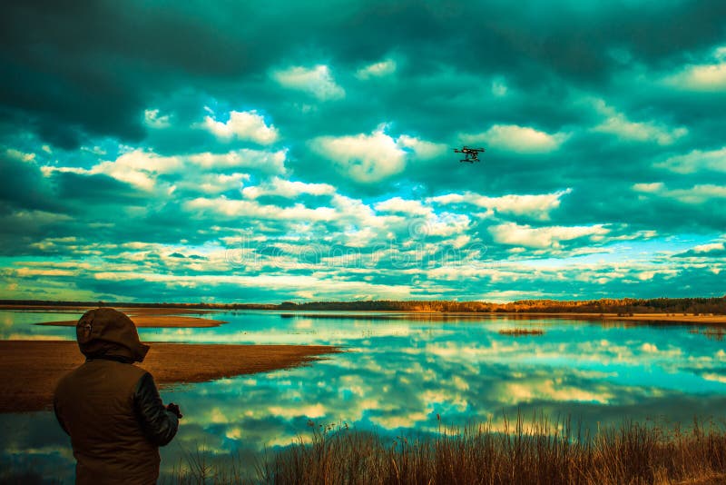 Man fly drone stock image. Image of commercial, helicopter - 69492395