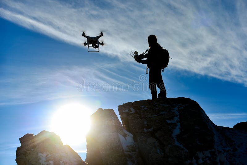 Man flying drone stock photo. Image of drone, stones - 118678724