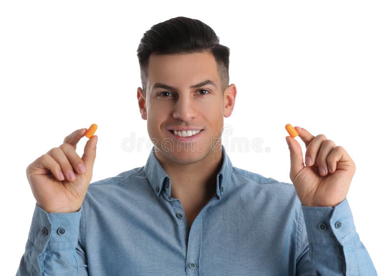 Man with Foam Ear Plugs on White Background Stock Photo - Image of ...