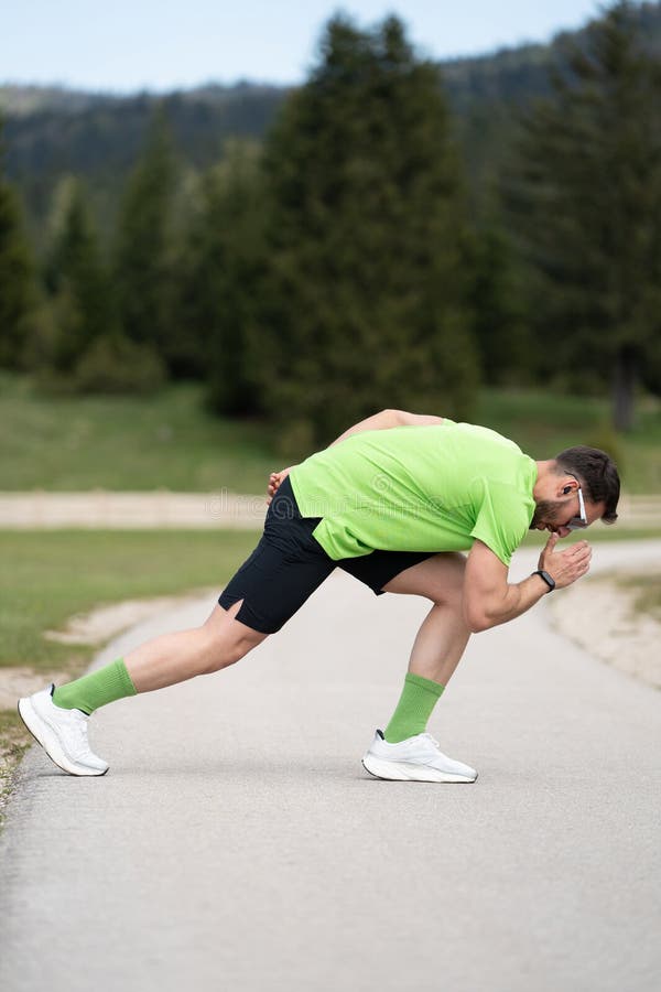 Man in Focus Preparing for Outdoor Sprint Stock Photo - Image of path ...