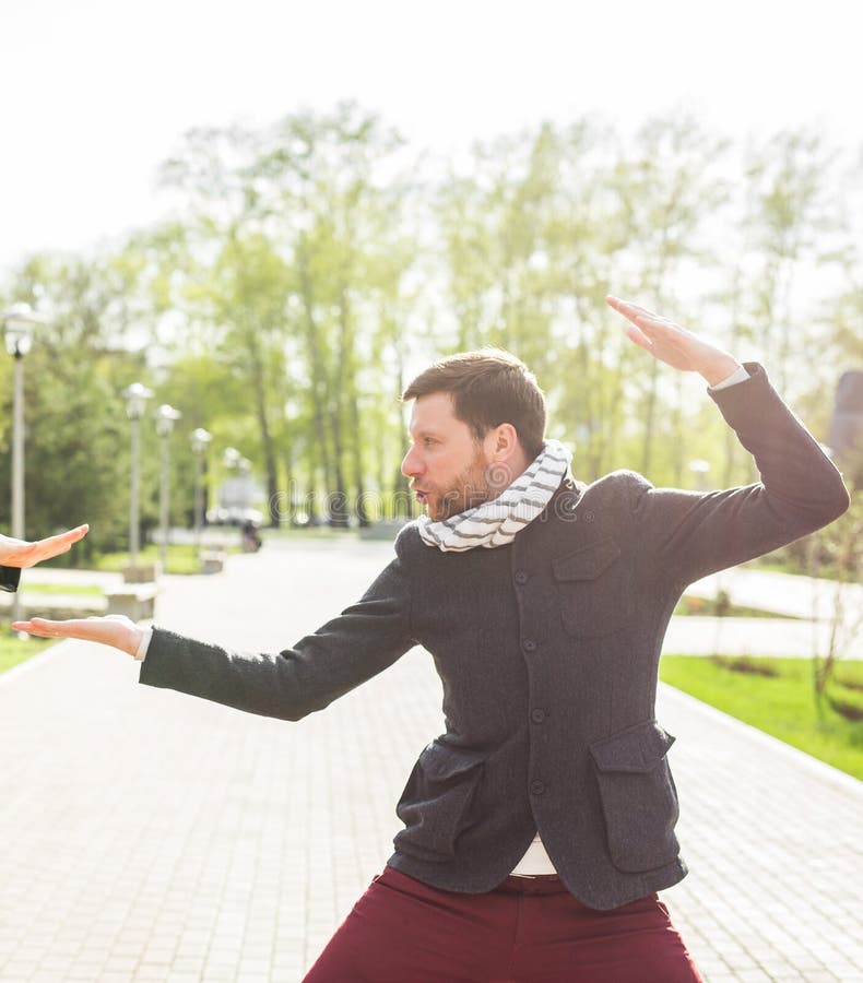 Young Couple Fooling Around in the Park Stock Photo - Image of bright ...