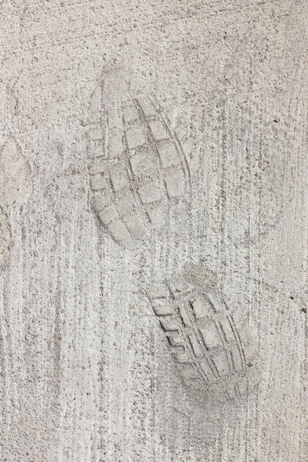 Man Footprints on Concrete Track Stock Image - Image of mark ...