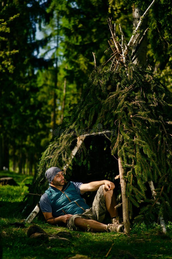 Man in forest stock photo. Image of wild, travel, shelter - 115187220