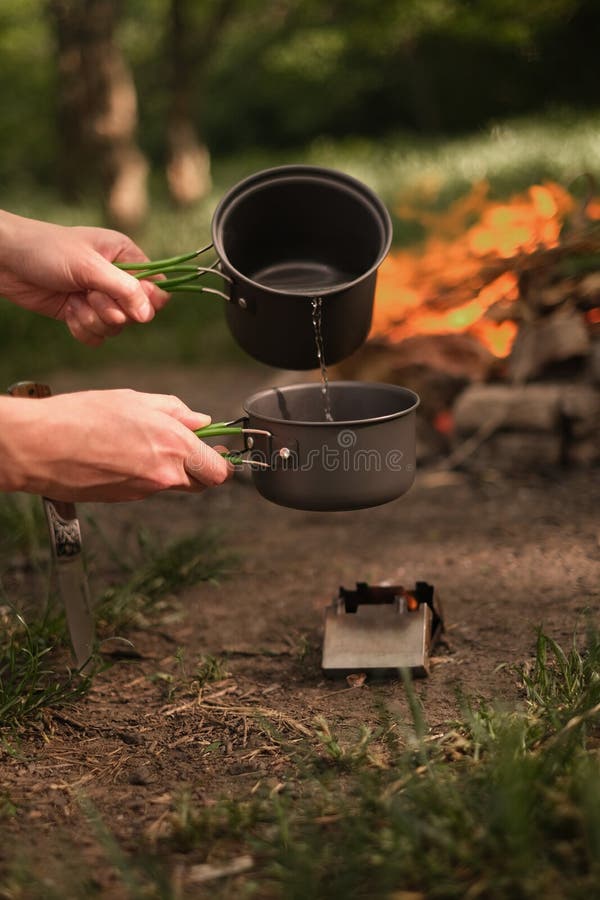 A Man in the Forest Prepares Food on the Fire. Rest on Self-isolation ...