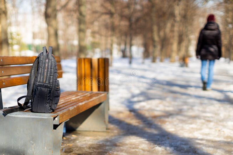 A Man Forgot His Bag on a Park Bench. Stock Image - Image of woman ...