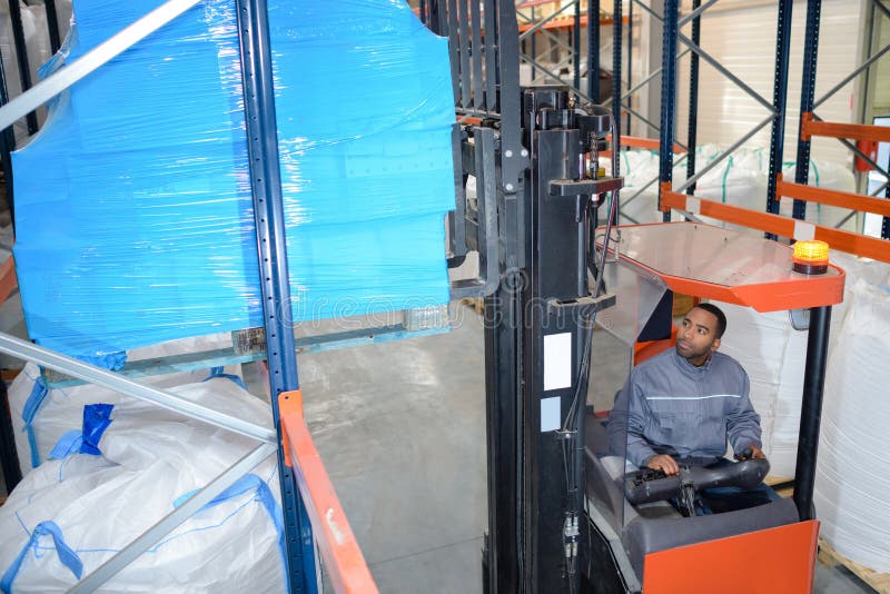 Man on Forklift Loader Loading Boxes at Warehouse Stock Image - Image ...