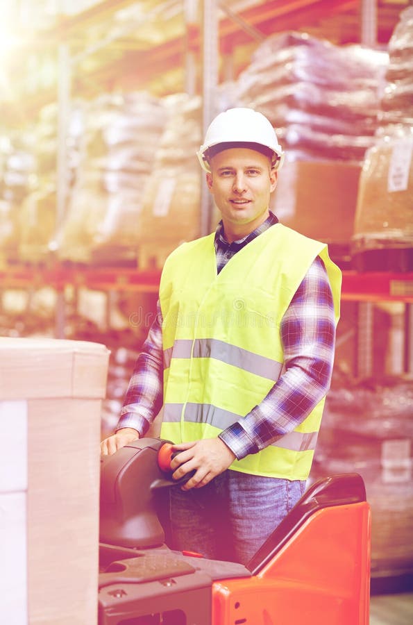 Man on Forklift Loading Cargo at Warehouse Stock Image - Image of ...
