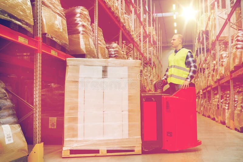 Man on Forklift Loading Cargo at Warehouse Stock Photo - Image of ...