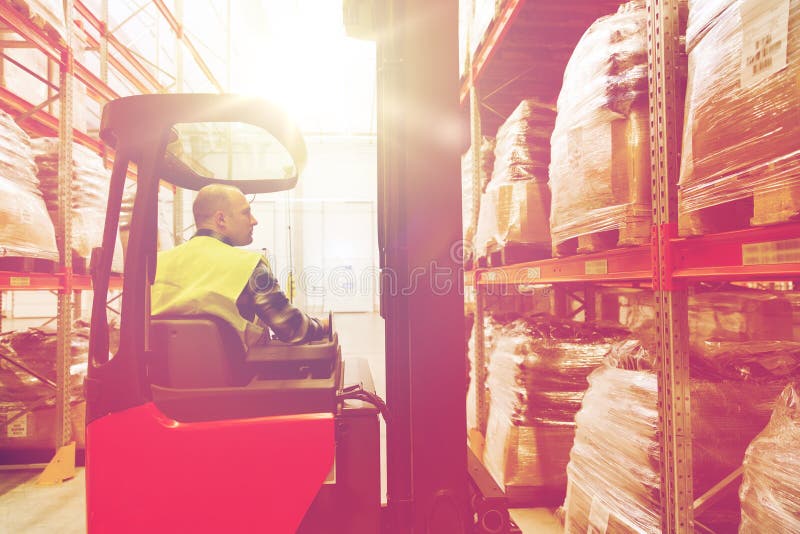 Man on Forklift Loading Boxes at Warehouse Stock Image - Image of ...