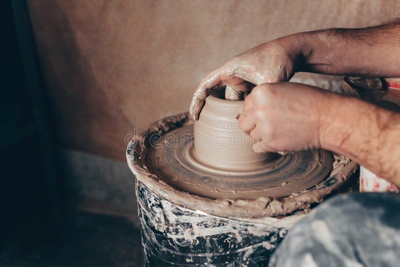 Man Forms a White Clay Product on a Pottery Wheel Side View Stock Photo ...