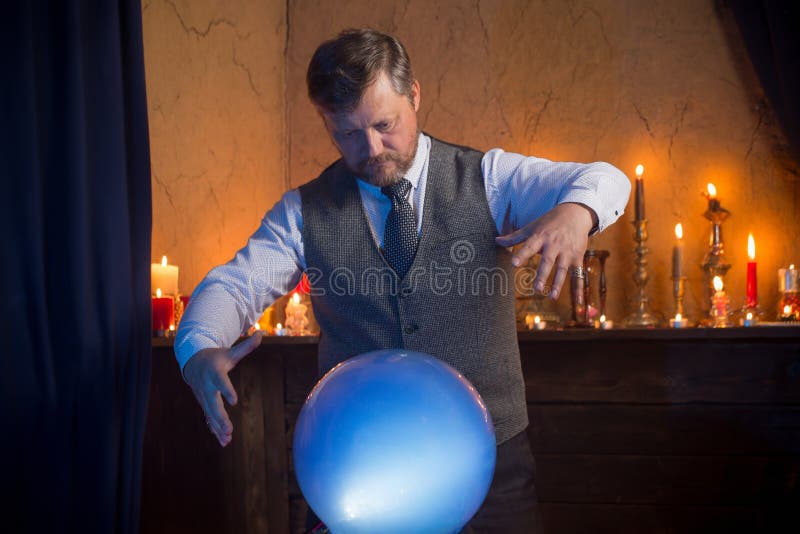 Man Fortune Teller with Illuminated Crystal Ball Stock Photo - Image of ...
