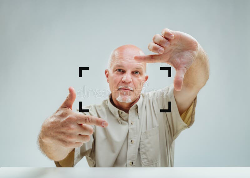 Man Frames Space, Envisioning with Pointed Precision Stock Photo ...