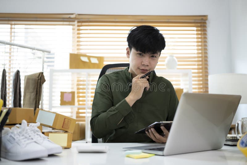 Freelancer Check Product Purchase Order on Laptop Computer while Work ...