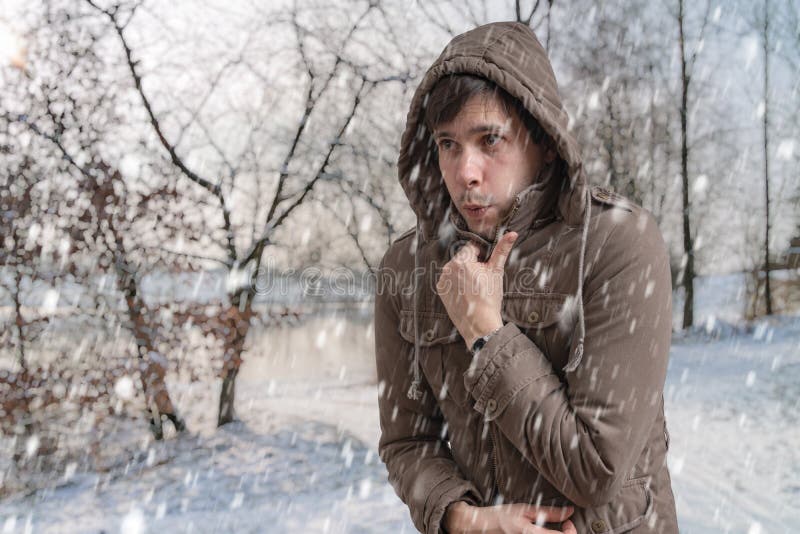 Man Freezing in Cold Weather Stock Image - Image of chilly, happy: 33156103