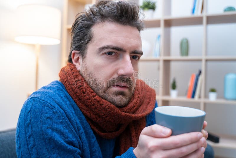 Man Freezing and Shivering at Home because of Winter Cold Stock Photo ...