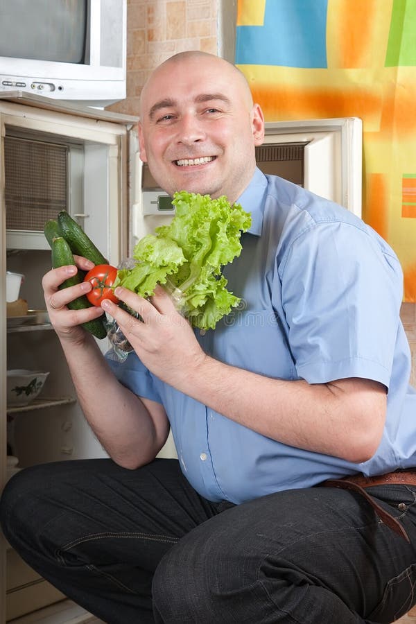 Man with fresh vegetables stock image. Image of meal - 21401949
