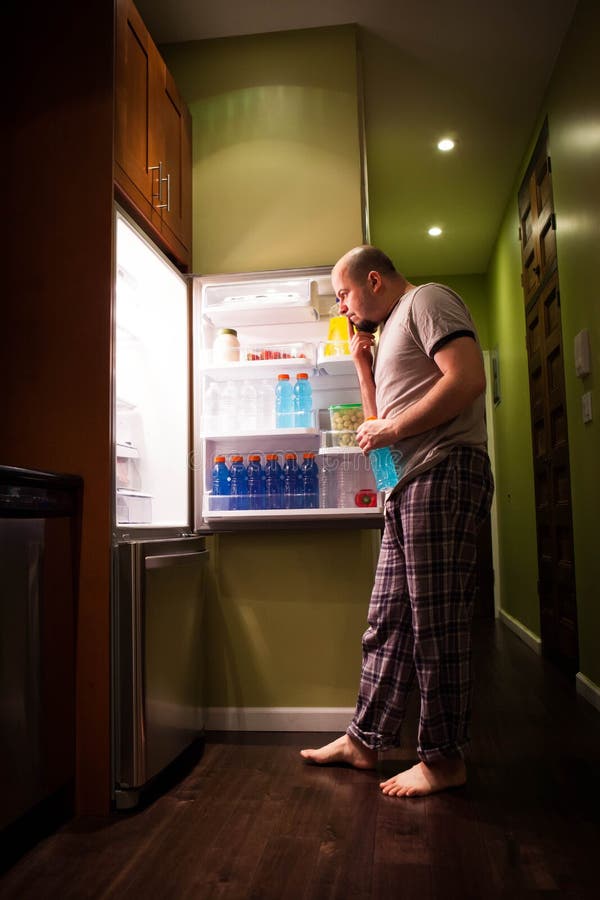 Man at fridge stock image. Image of floor, pajama, green - 35599927