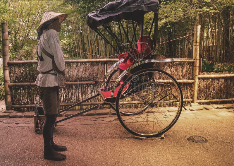 Man In Front Of Black And Red Carriage Picture. Image: 115110823