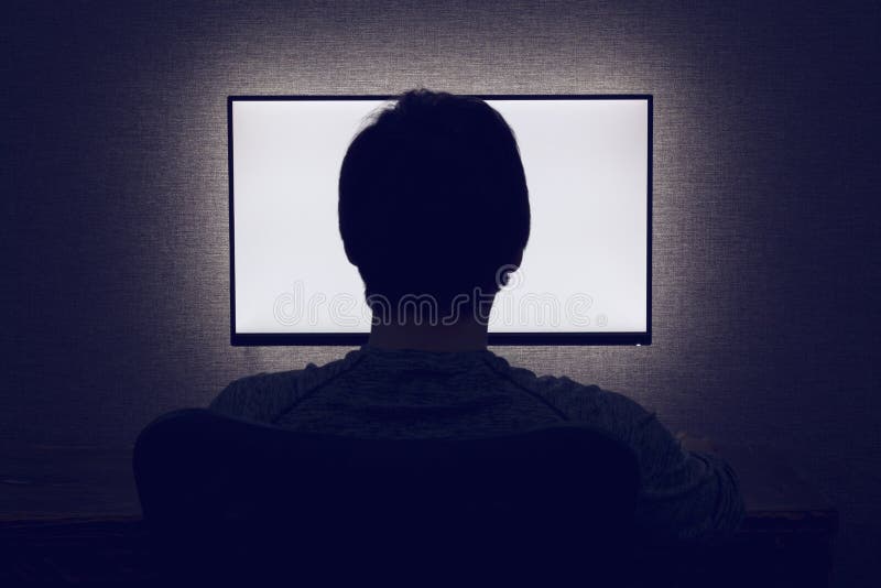 Man Seated in Front of Computer Monitor at Night Stock Photo - Image of ...