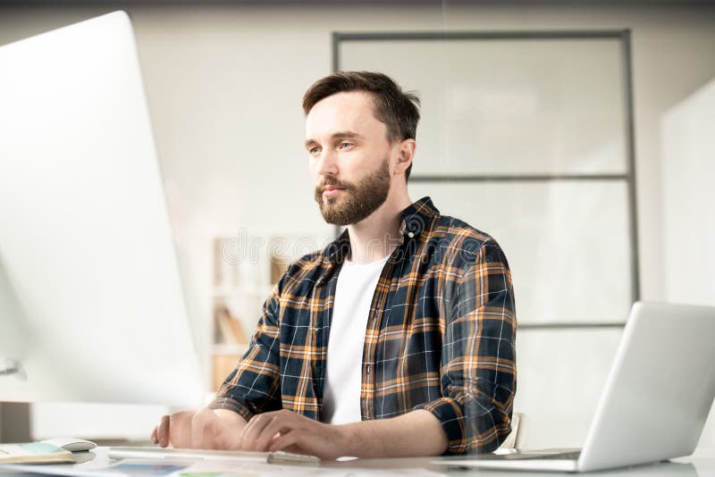 Man in front of computer stock image. Image of developer - 144839163