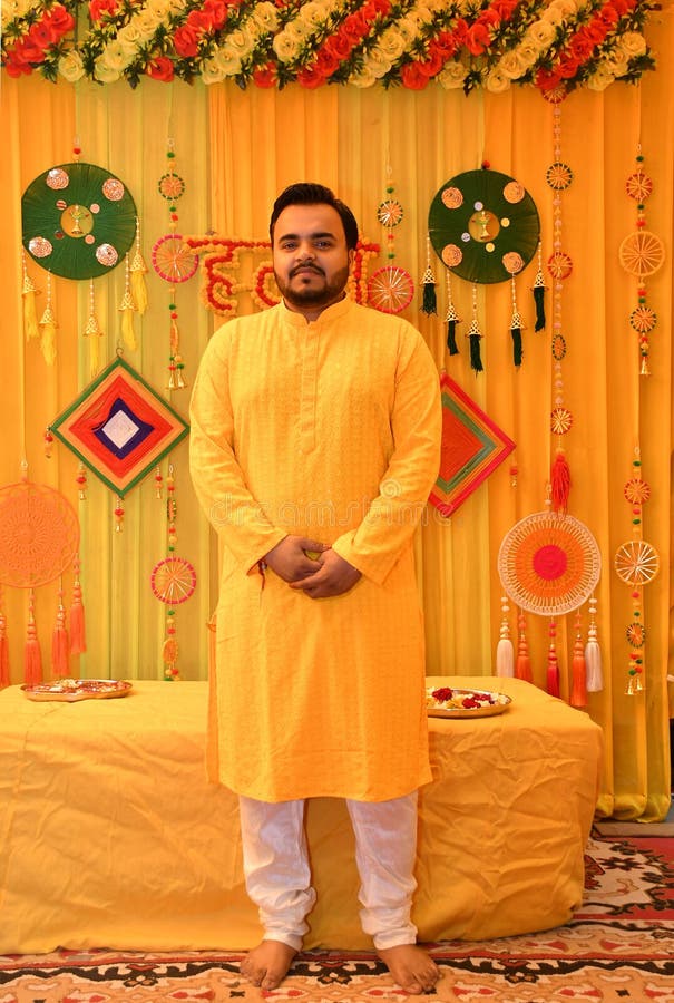 Man in Front of Wedding Backdrop at Reception in Haldi Ceremony Stock ...