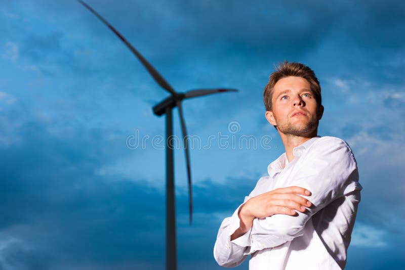 Man in Front of Windmill and Sky Stock Image - Image of outdoors ...