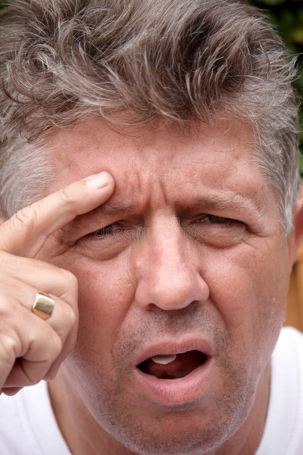 A man frowning stock photo. Image of person, face, close - 23829226