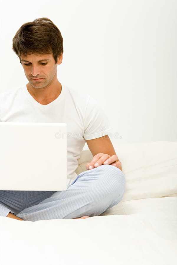 Man Frowning at Laptop Computer Stock Photo - Image of latino ...