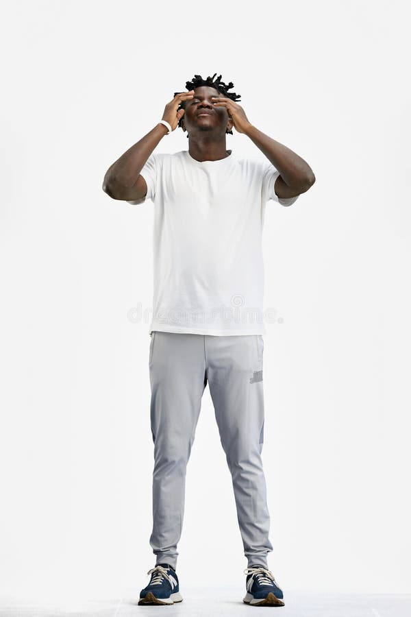 A Man, Full-length, on a White Background, Clutched His Head Stock ...