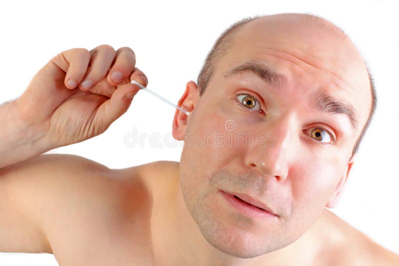 Man With Funny Look Using A Q-tip Picture. Image: 9458519