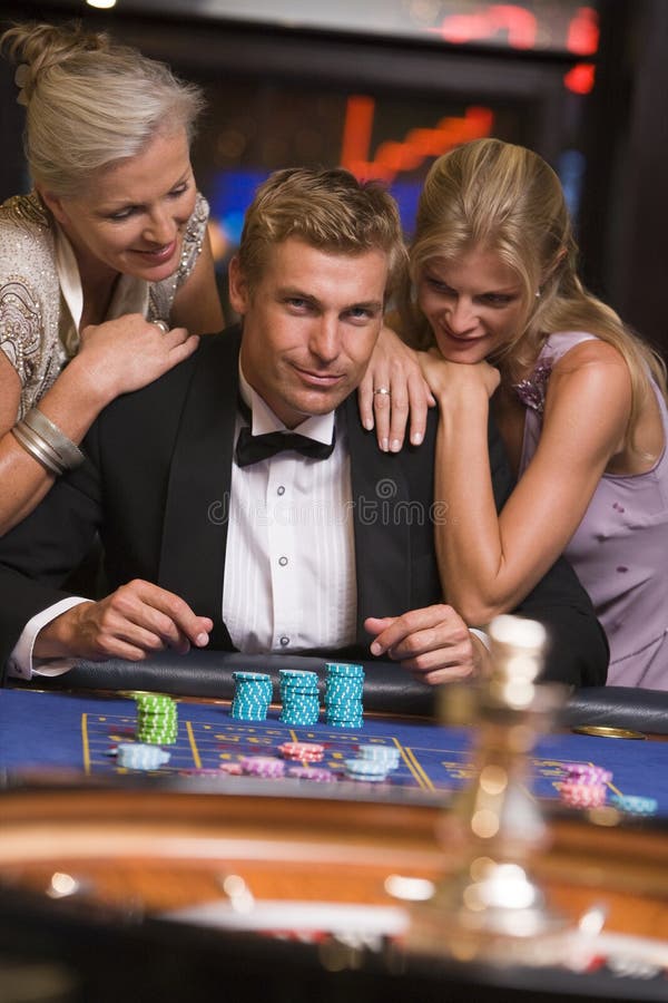 Man gambling in casino stock photo. Image of happy, male - 5211780