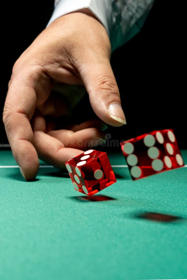 Man Gambling at the Craps Table Stock Photo - Image of hand ...