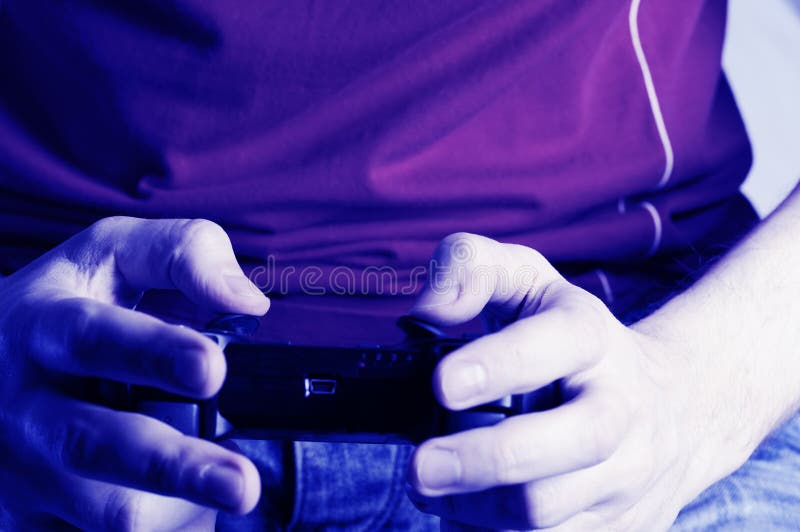Man with game pad. stock photo. Image of adult, game - 13857364