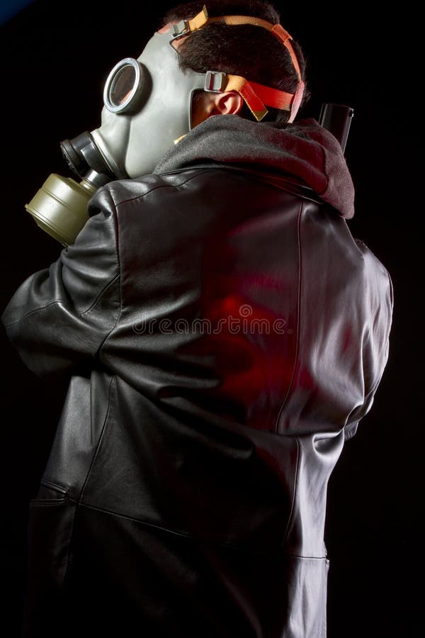 Man with Gas Mask and Gun, Dressed in Black Stock Photo - Image of ...