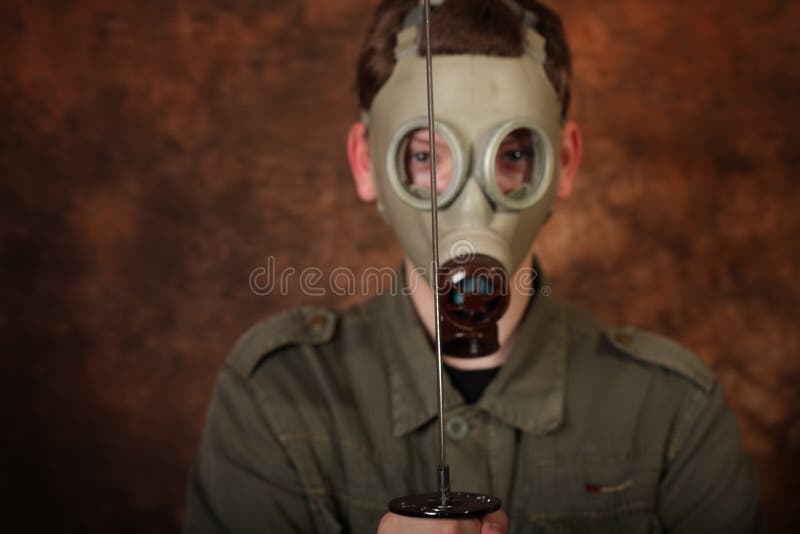Man with Gas Mask and Katana Sword on Black Background Stock Photo ...