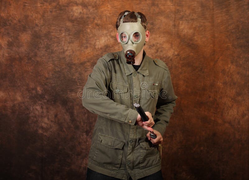 Man with Gas Mask and Katana Sword on Brown Batik Background Stock ...
