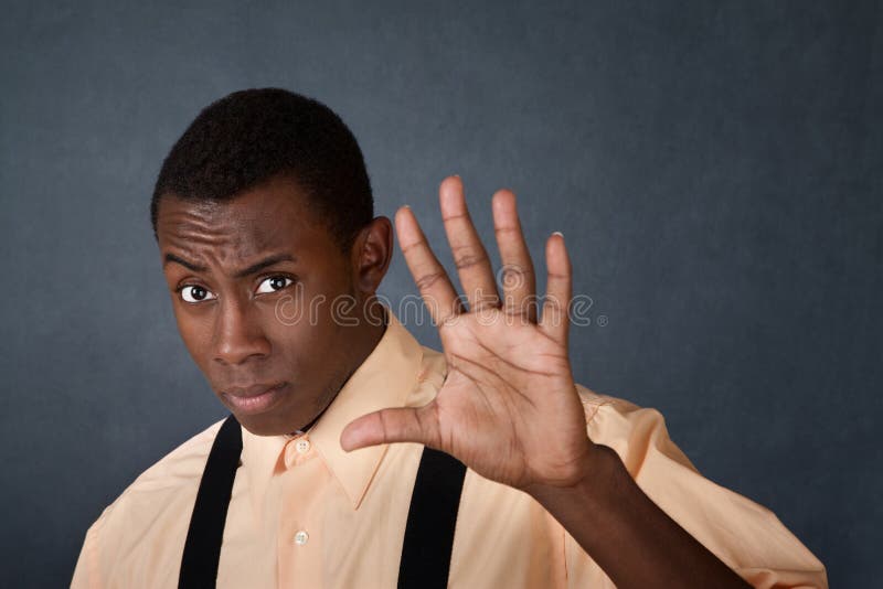 Man Gestures Stay Back stock image. Image of serious - 19456991