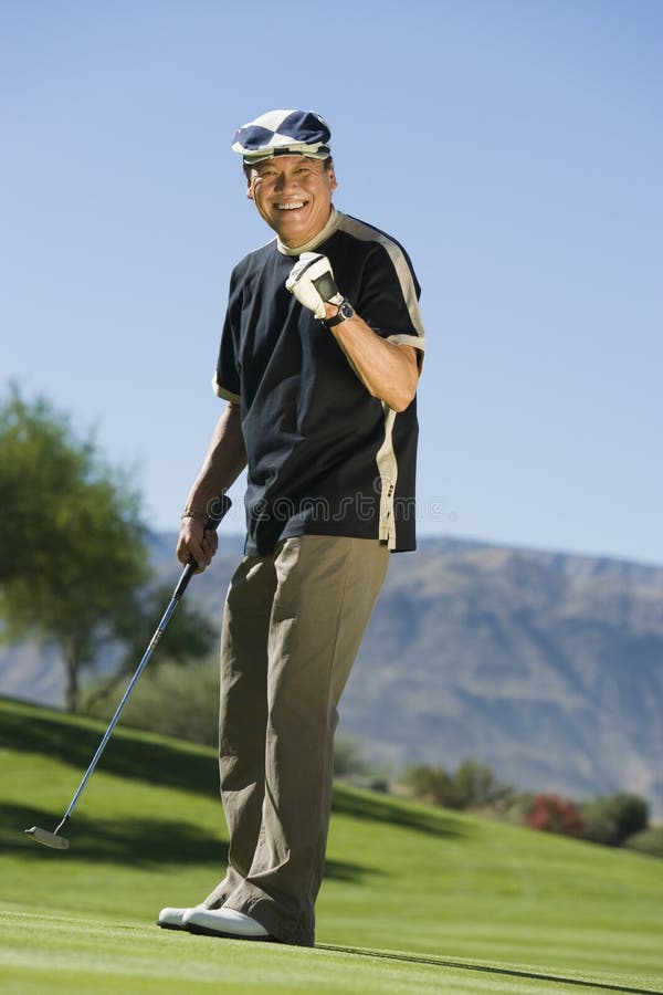Man Gesturing on Golf Course Stock Image - Image of outdoors, people ...