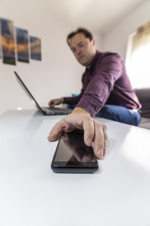 Man Getting a Call and Taking His Mobile Phone Stock Image - Image of ...