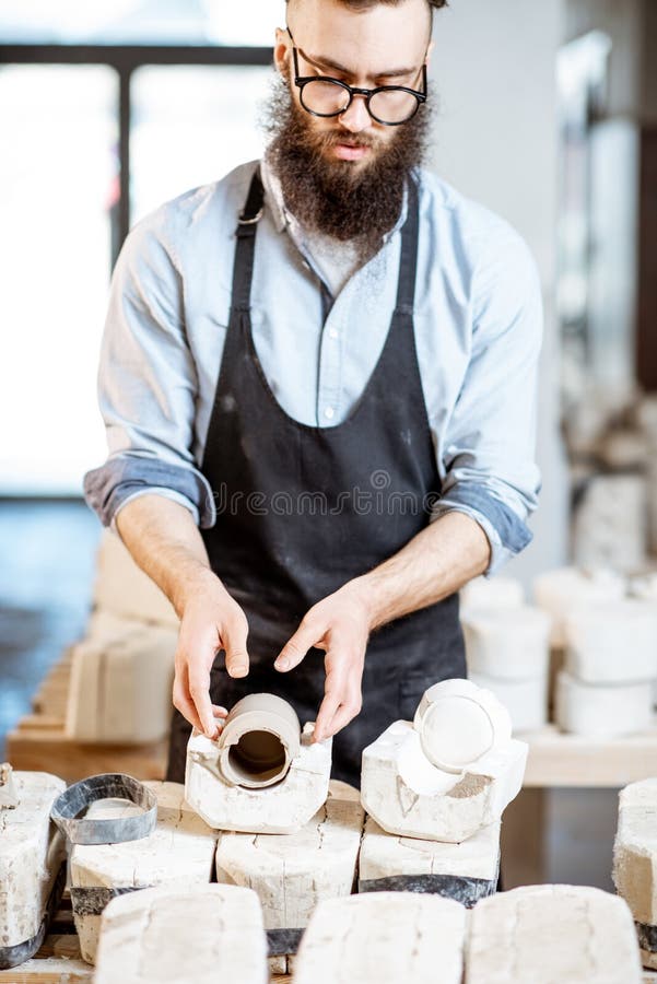 Worker Forming Ceramics at the Pottery Manufacturing Stock Image ...