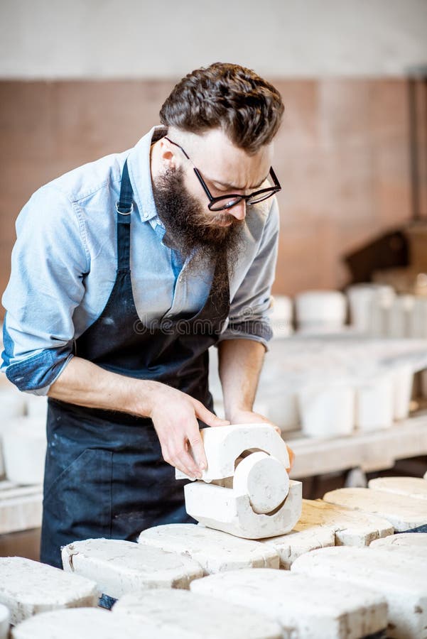 Worker Forming Ceramics at the Pottery Manufacturing Stock Image ...