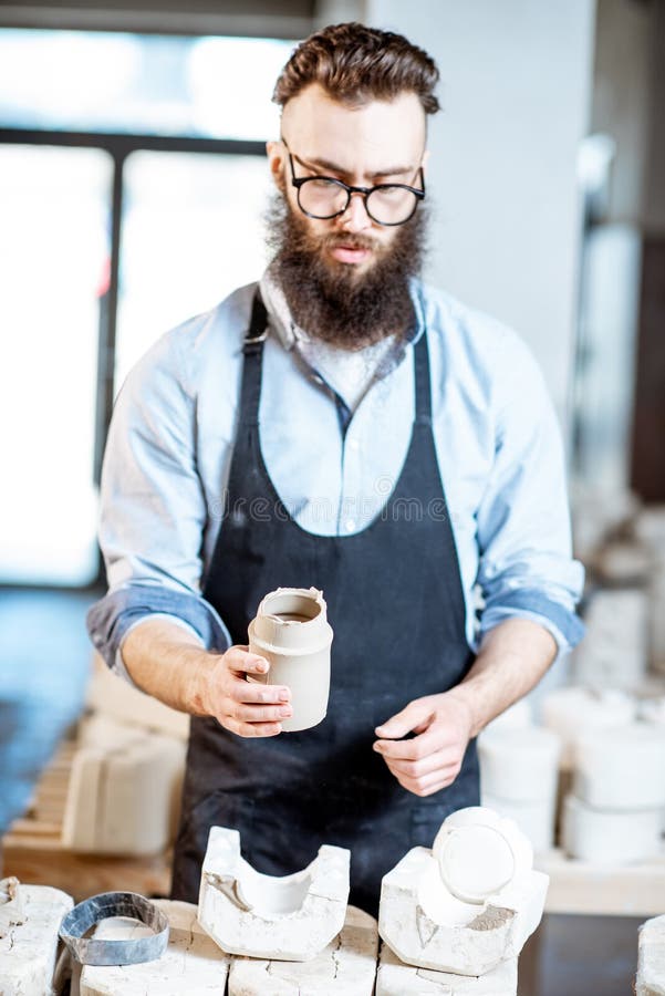 Worker Forming Ceramics at the Pottery Manufacturing Stock Image ...