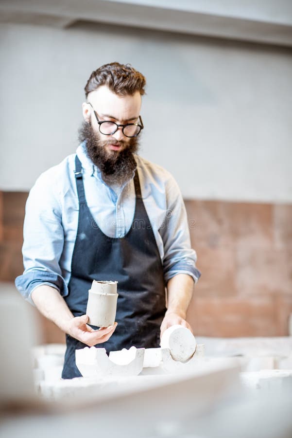 Worker Forming Ceramics at the Pottery Manufacturing Stock Image ...