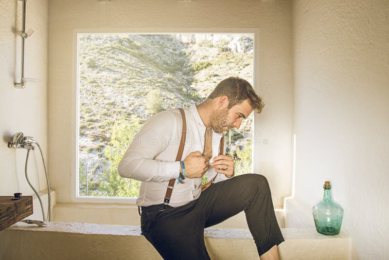 Man Getting Dressed in the Bathroom.Man Getting Changed at Home Stock ...