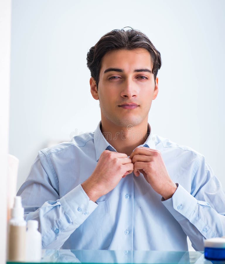 Man is Getting Dressed Up for Work in Bathroom Stock Photo - Image of ...