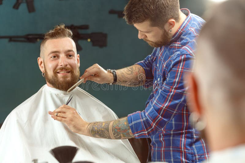 Man Getting His Beard Shaved in a Barber Shop Stock Image - Image of ...