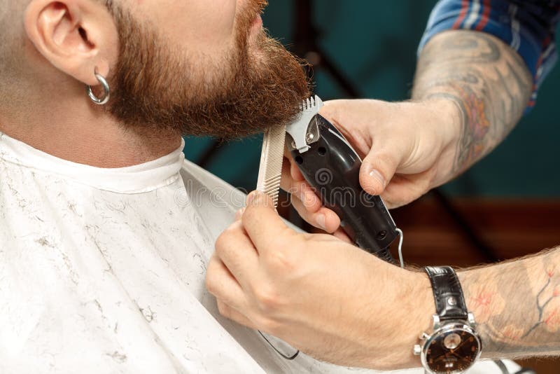Man Getting His Beard Shaved in a Barber Shop Stock Image - Image of ...