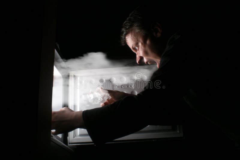 Man getting ice stock image. Image of freezer, cold, frozen - 15127011
